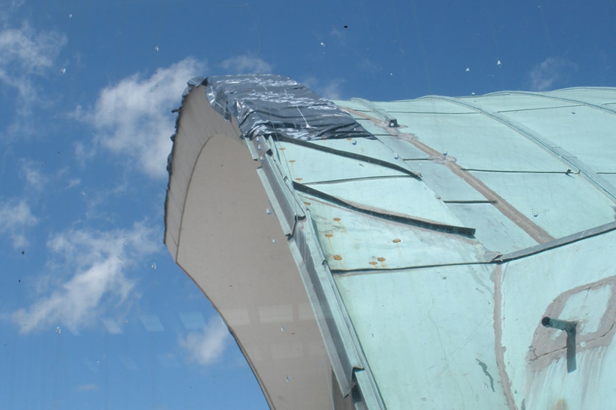 Lambert-roof-post-2011-storm.jpg – Trivers